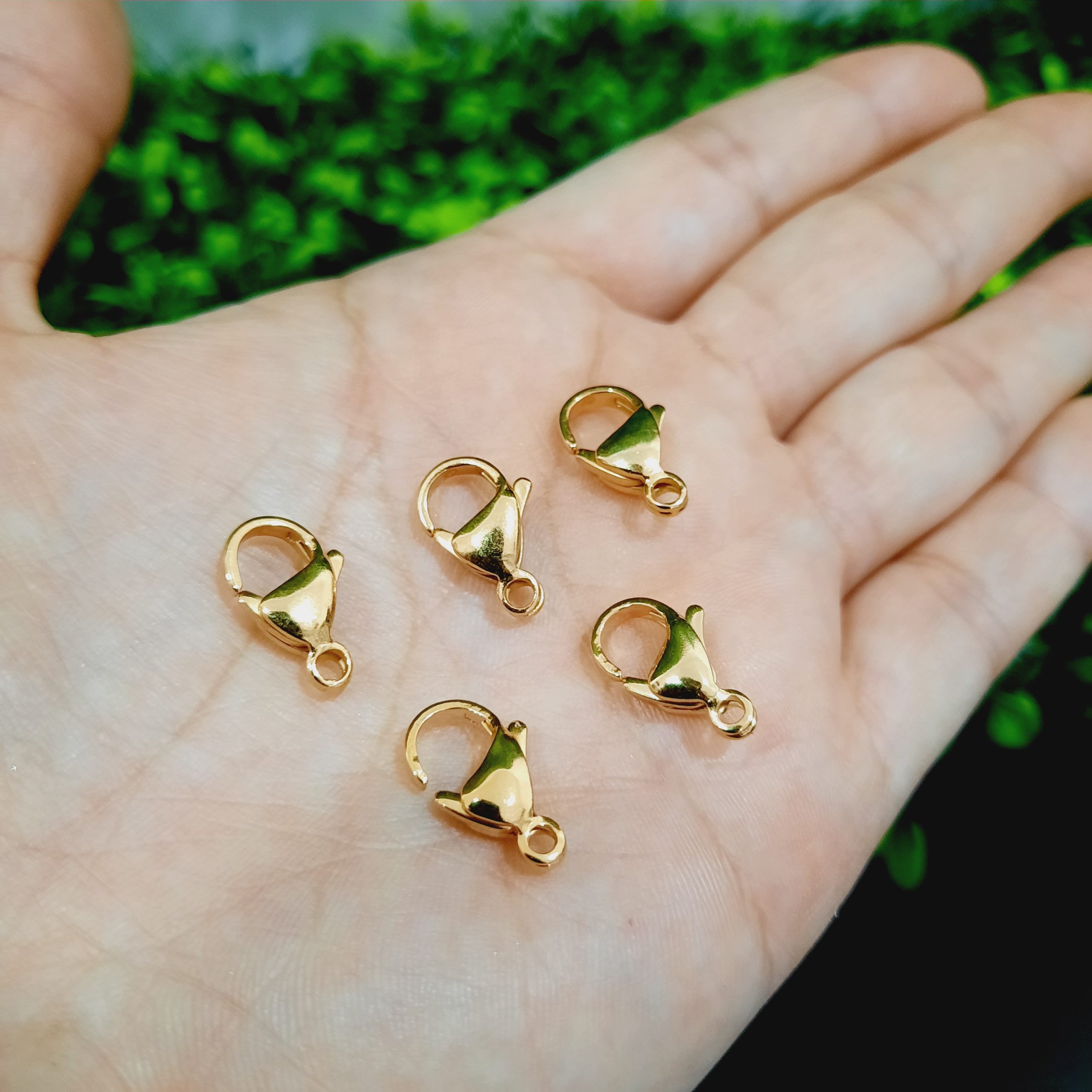 Broche dorado de perico mediano en acero inoxidable – TIENDA INSUMOS CORAL