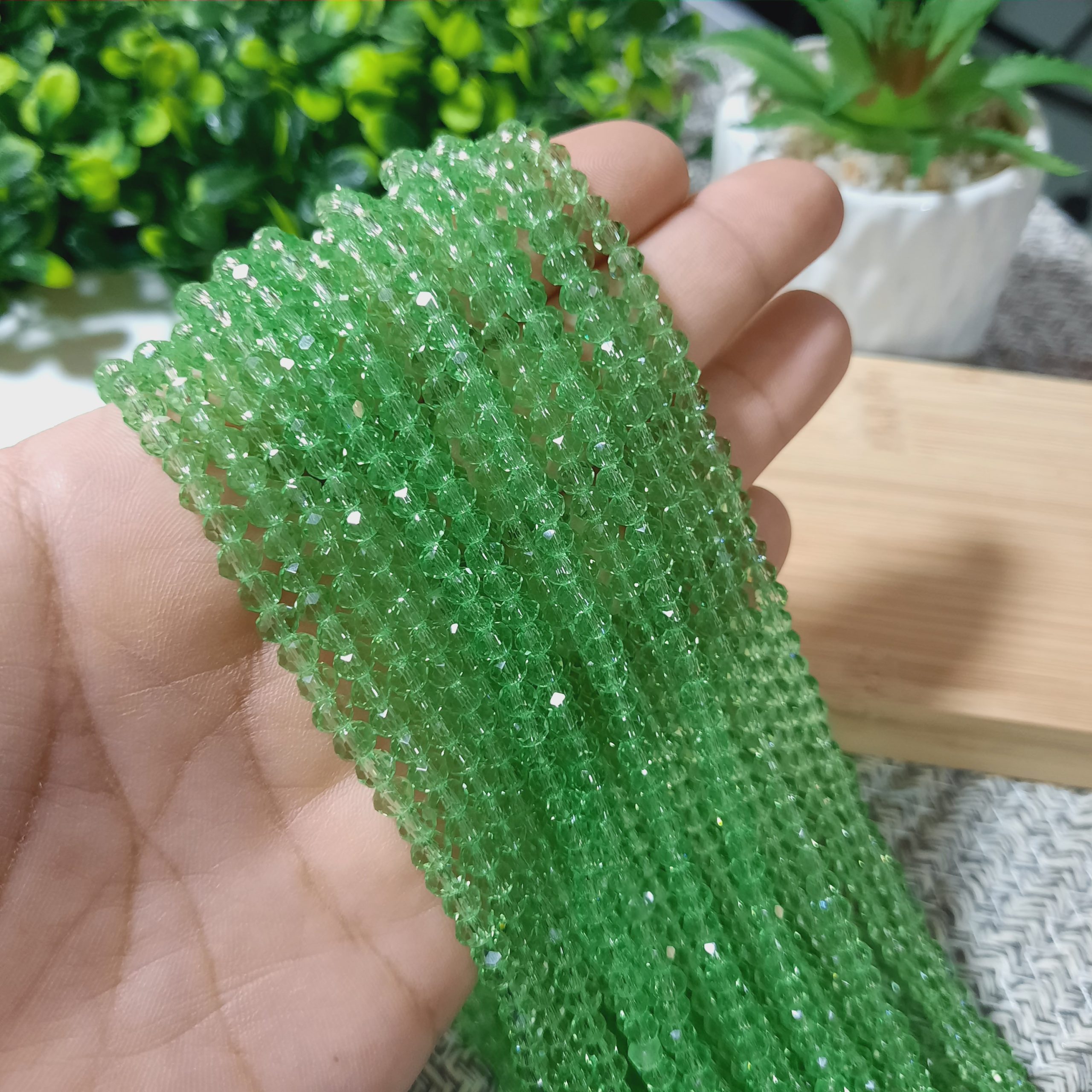 Cristal rondel color verde claro traslucido – 4mm – TIENDA INSUMOS CORAL
